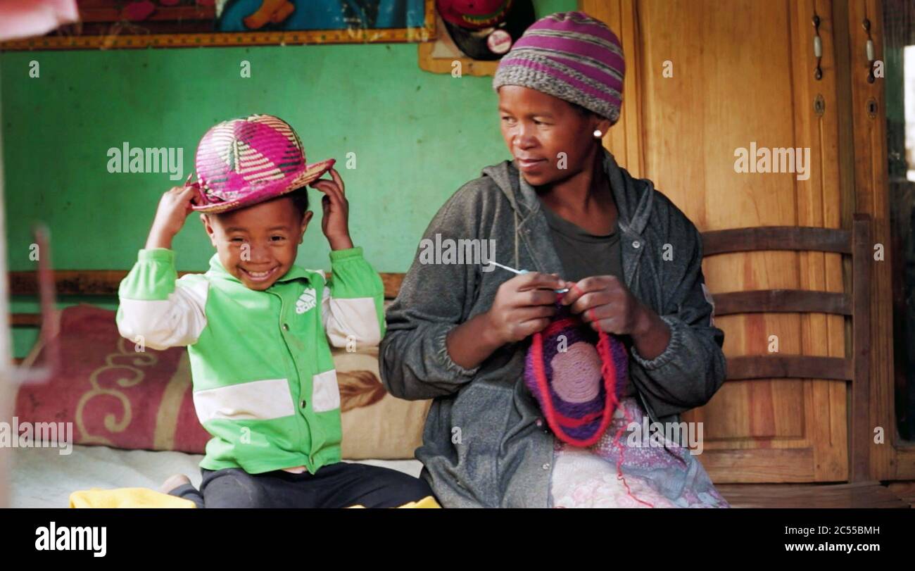 MADAGASIKARA, Tina and one of her sons, 2018. © Global Digital ...