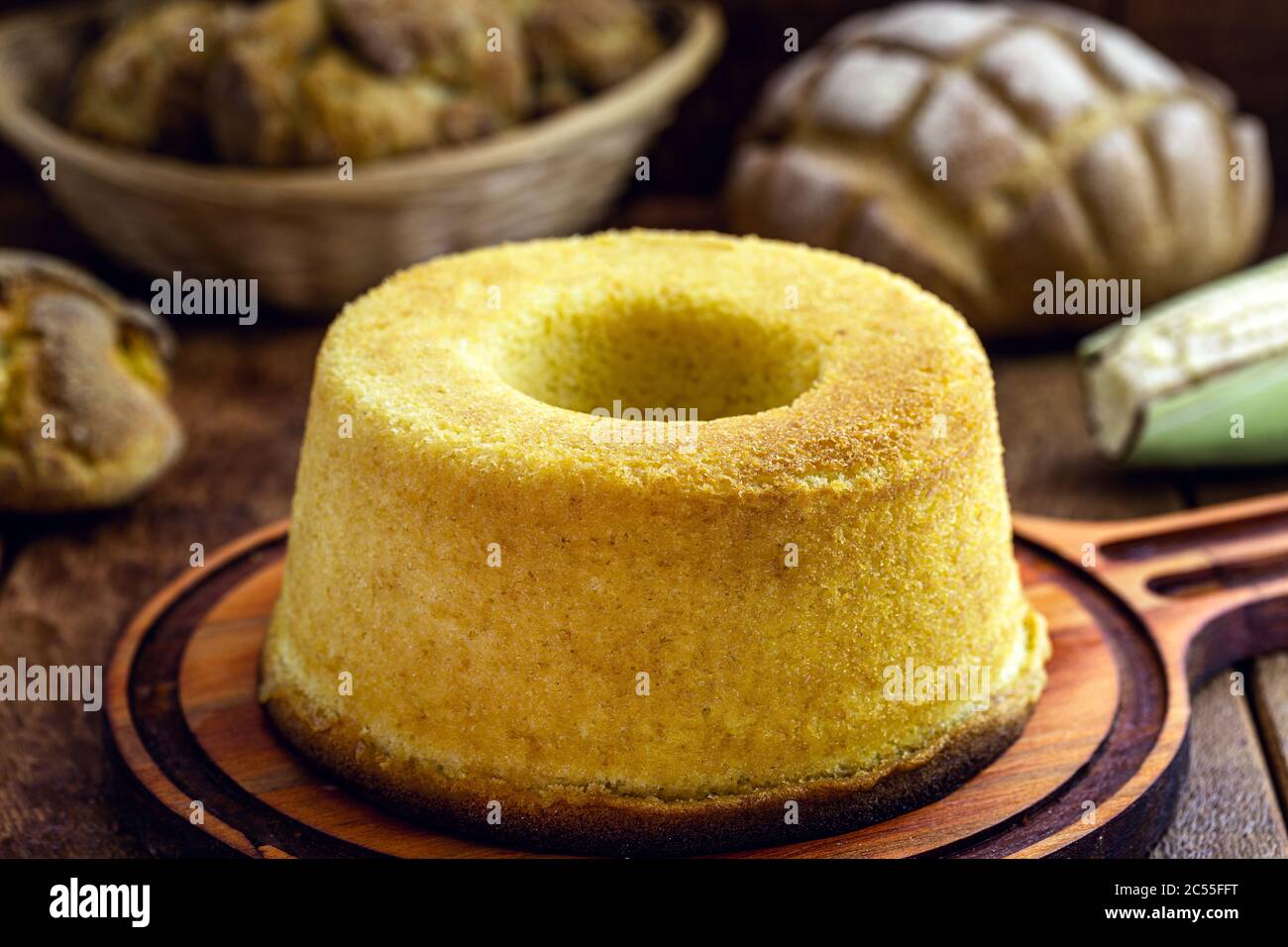 table with cornmeal cake, broa (bruninha or broa), typical Brazilian ...