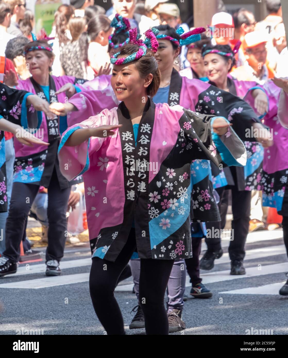 Folk dancers in colorful yukata dancing in Shibuya Kagoshima Ohara ...