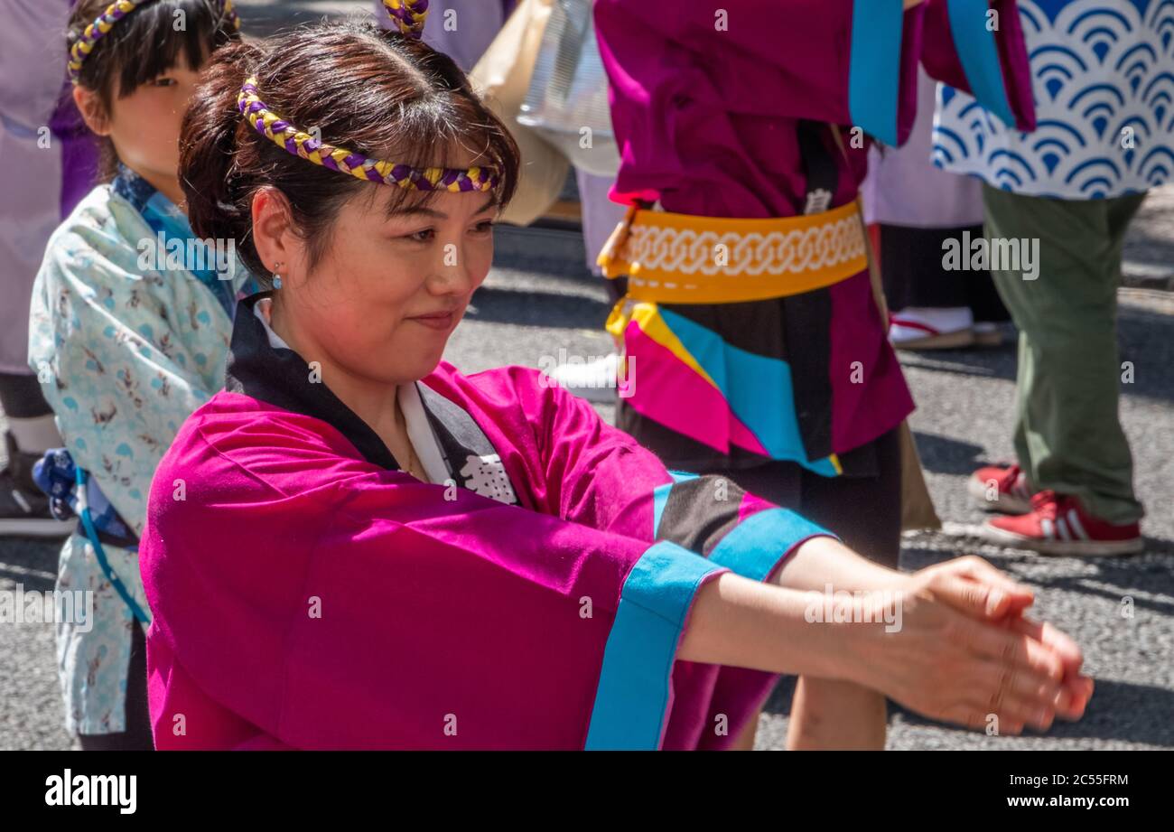 Folk dancers in colorful yukata dancing in Shibuya Kagoshima Ohara ...