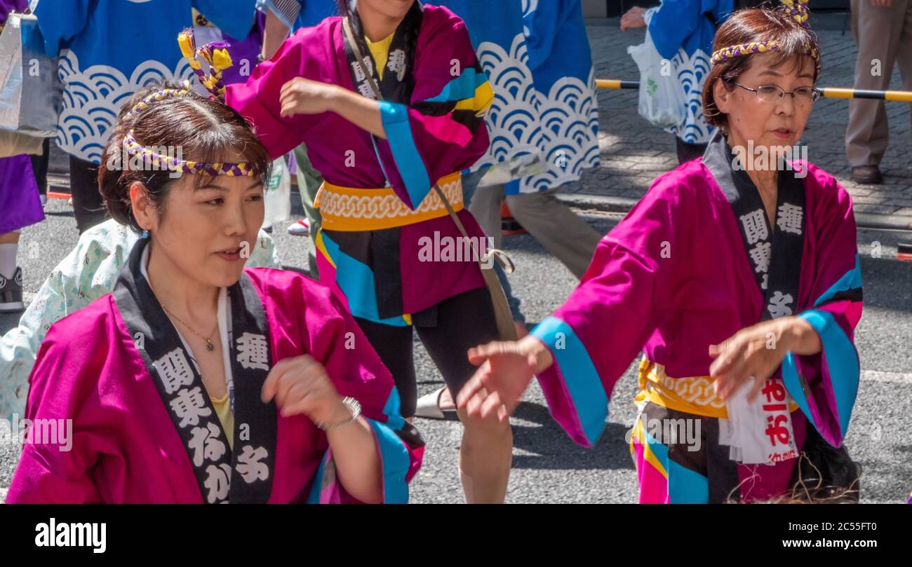Folk dancers in colorful yukata dancing in Shibuya Kagoshima Ohara ...