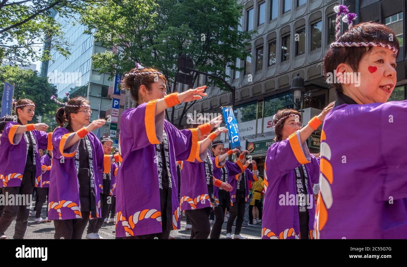 Folk dancers in colorful yukata dancing in Shibuya Kagoshima Ohara ...