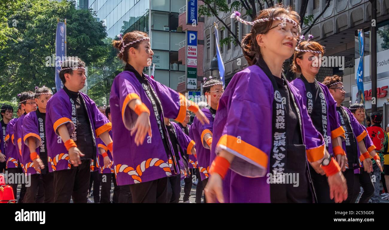 Folk dancers in colorful yukata dancing in Shibuya Kagoshima Ohara ...