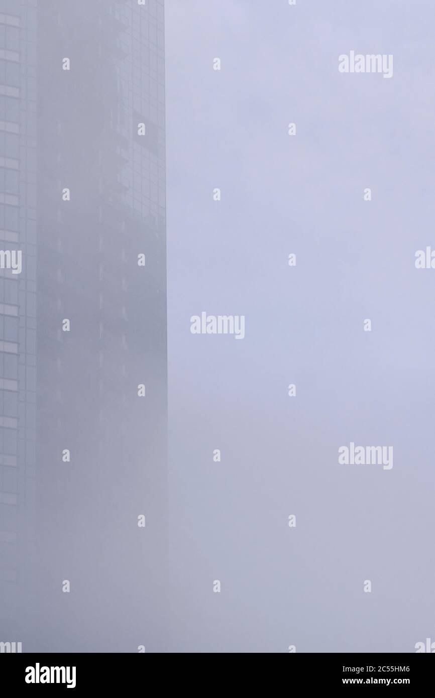 Urban Skyscrappers in Foggy Weather Stock Photo - Alamy