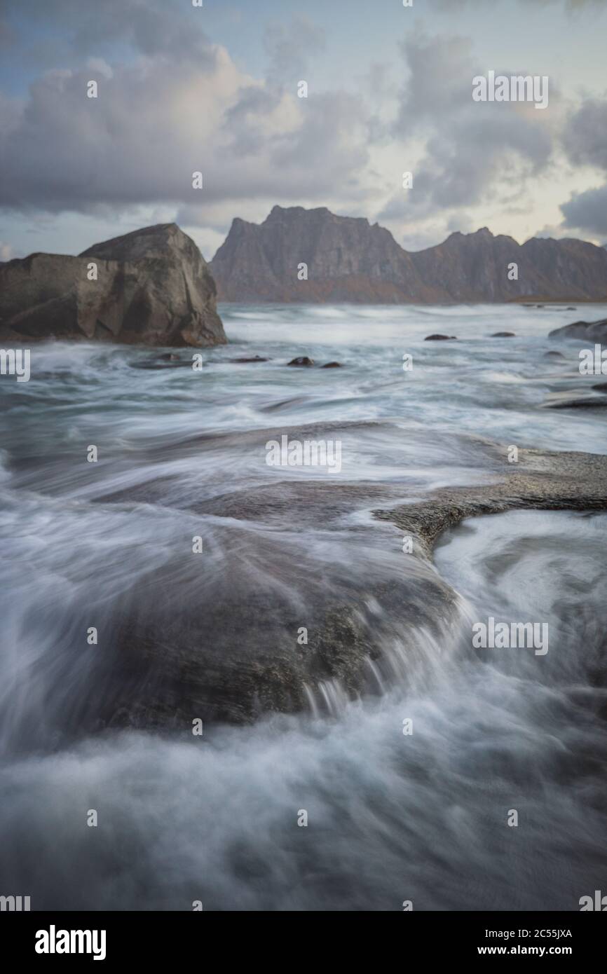 water over rocks in lofoten islands Stock Photo - Alamy