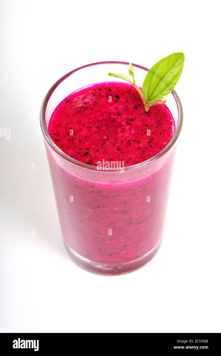 Red dragon fruit smoothies in glasses isolated on white background ...