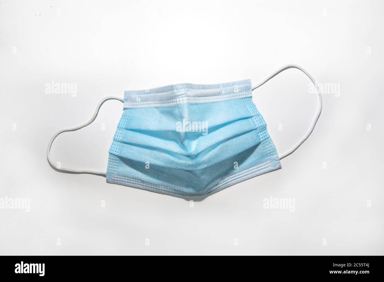 A top view of a surgical face mask isolated on a white background Stock ...
