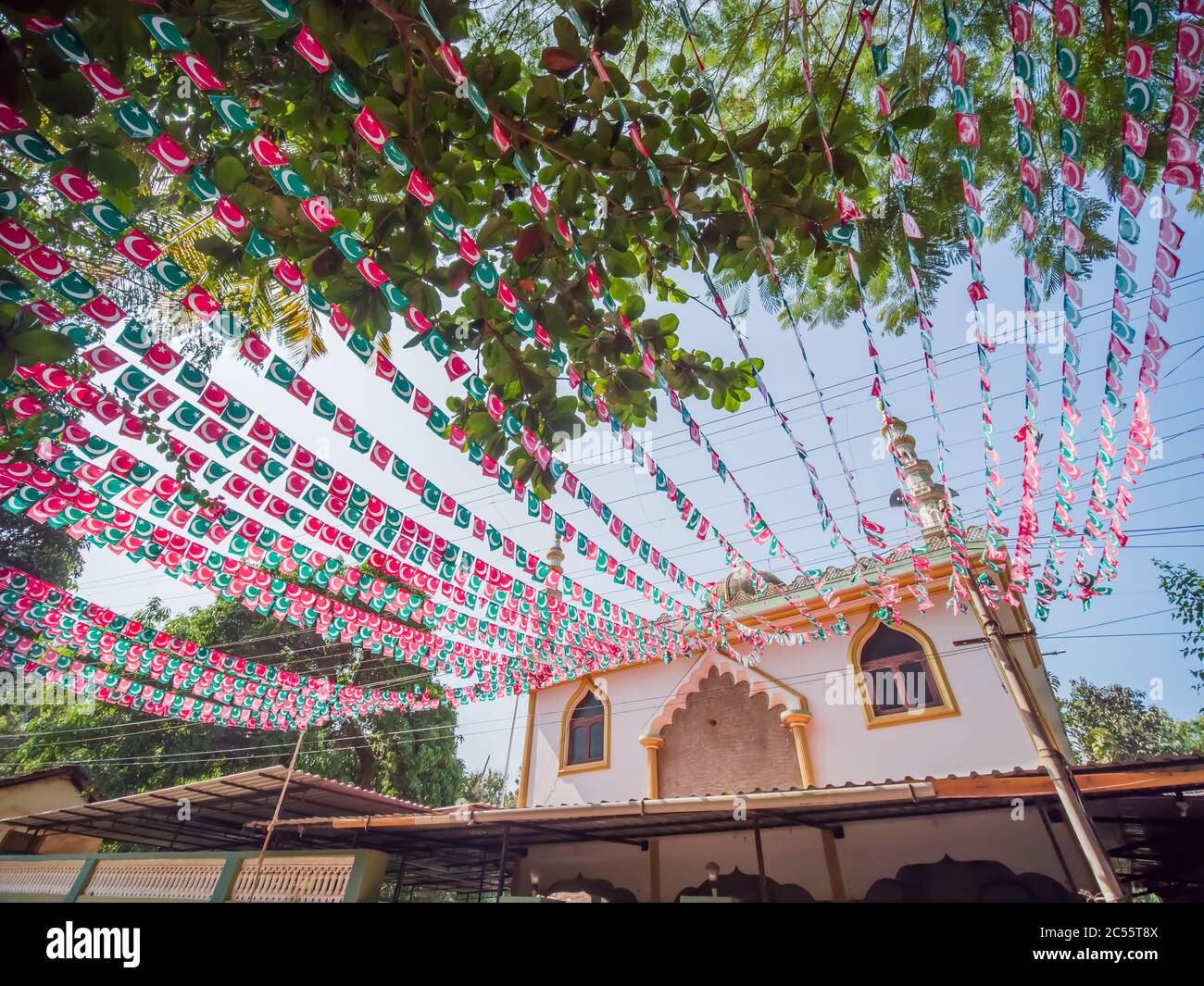 Small flags of the Indian Union Muslim League are hung over the streets ...
