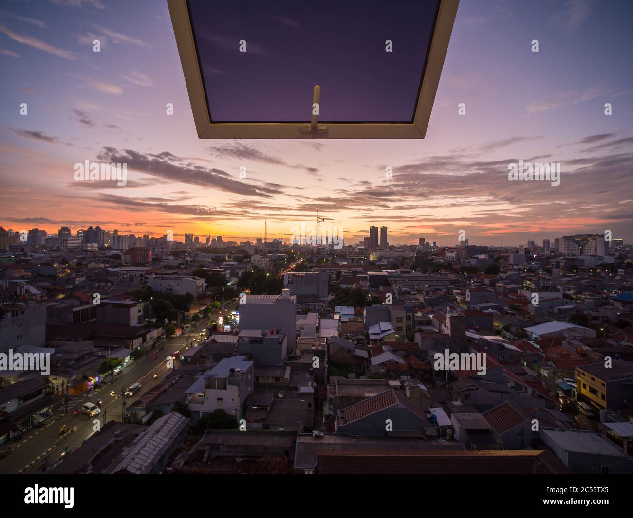 Beautiful sunset over the capital of Indonesia - Jakarta Stock Photo ...