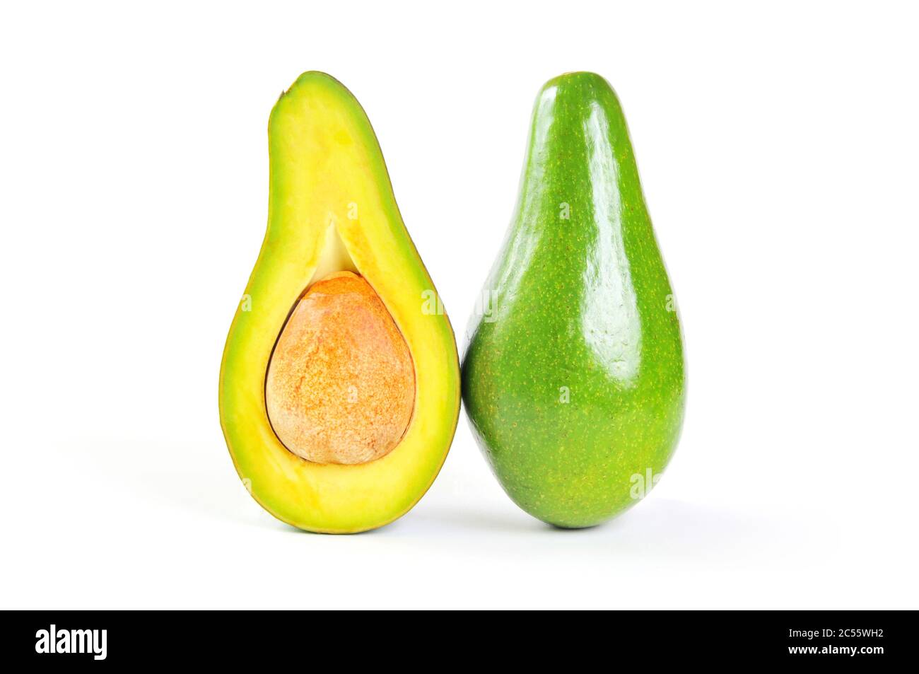Half sliced avocado and whole isolated on white background Stock Photo ...