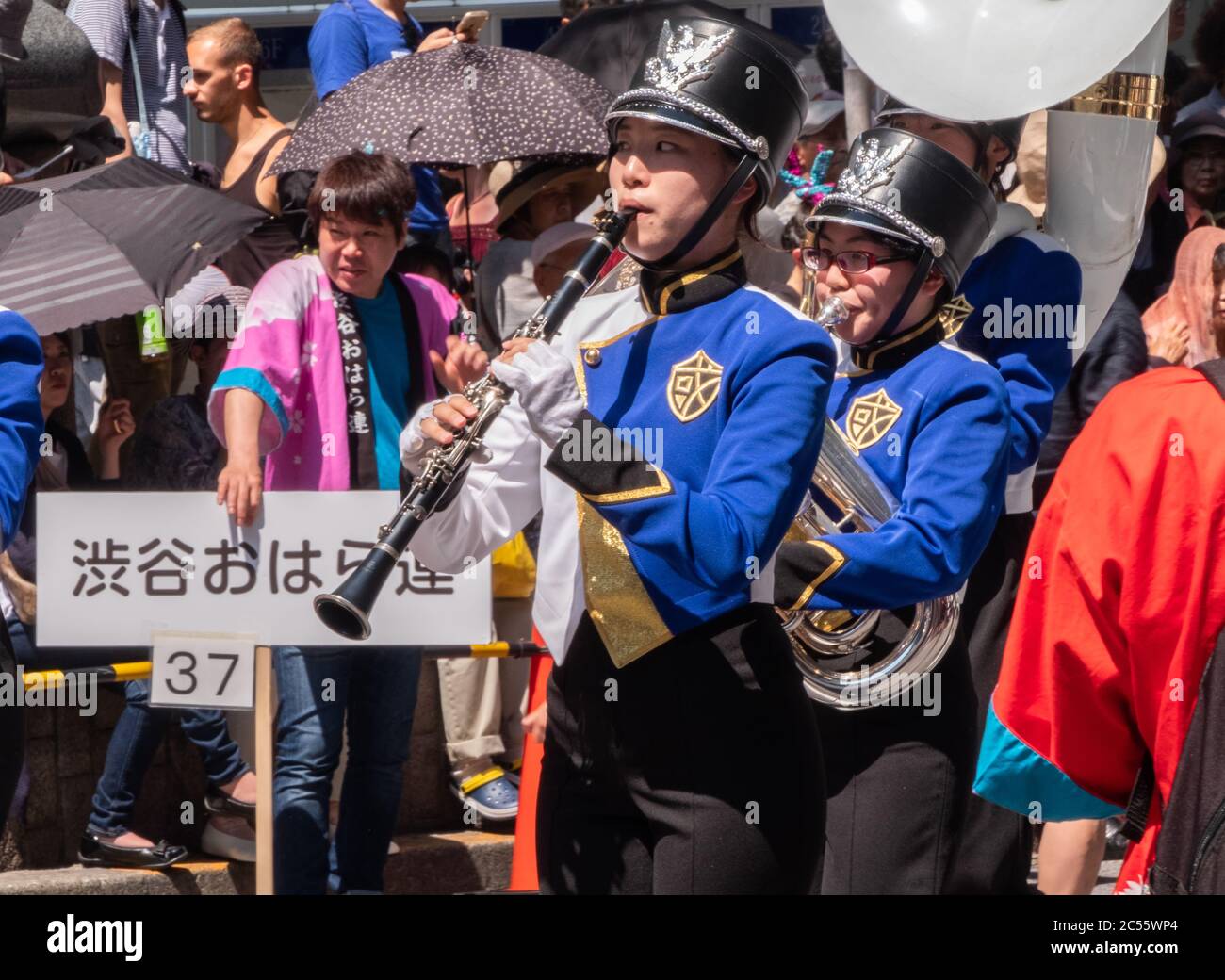 Marching school band participating in the Shibuya Kagoshima Ohara ...