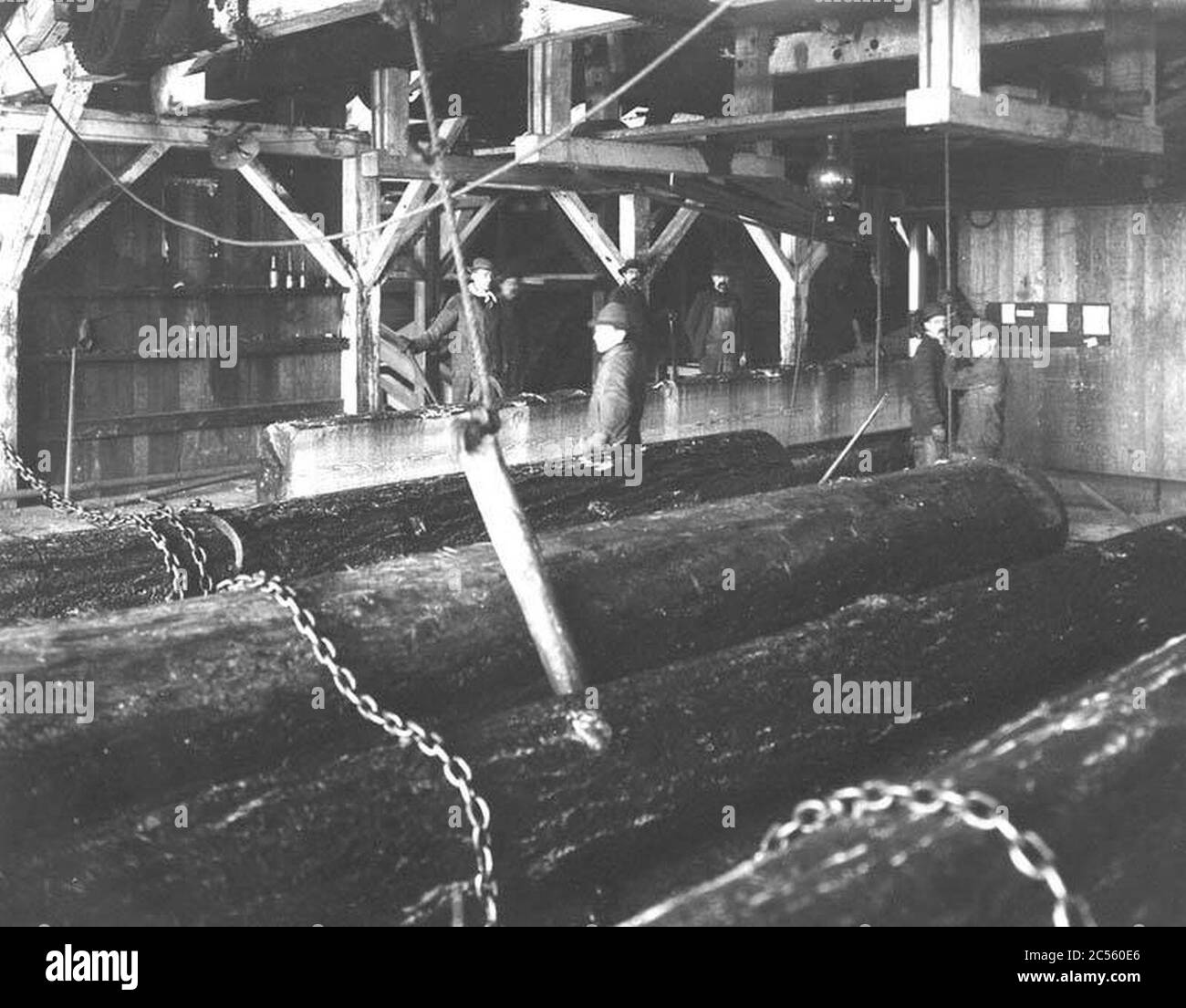Interior of Moran Brothers Co sawmill Seattle loading saw carriage ...