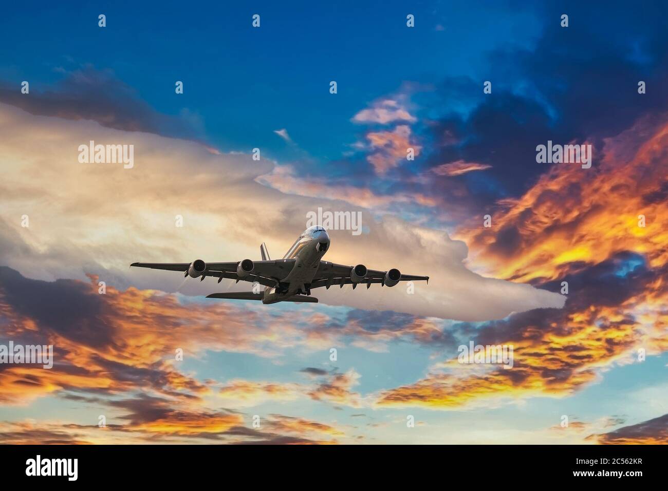 Plane Taking Off at Sunrise Stock Photo - Alamy