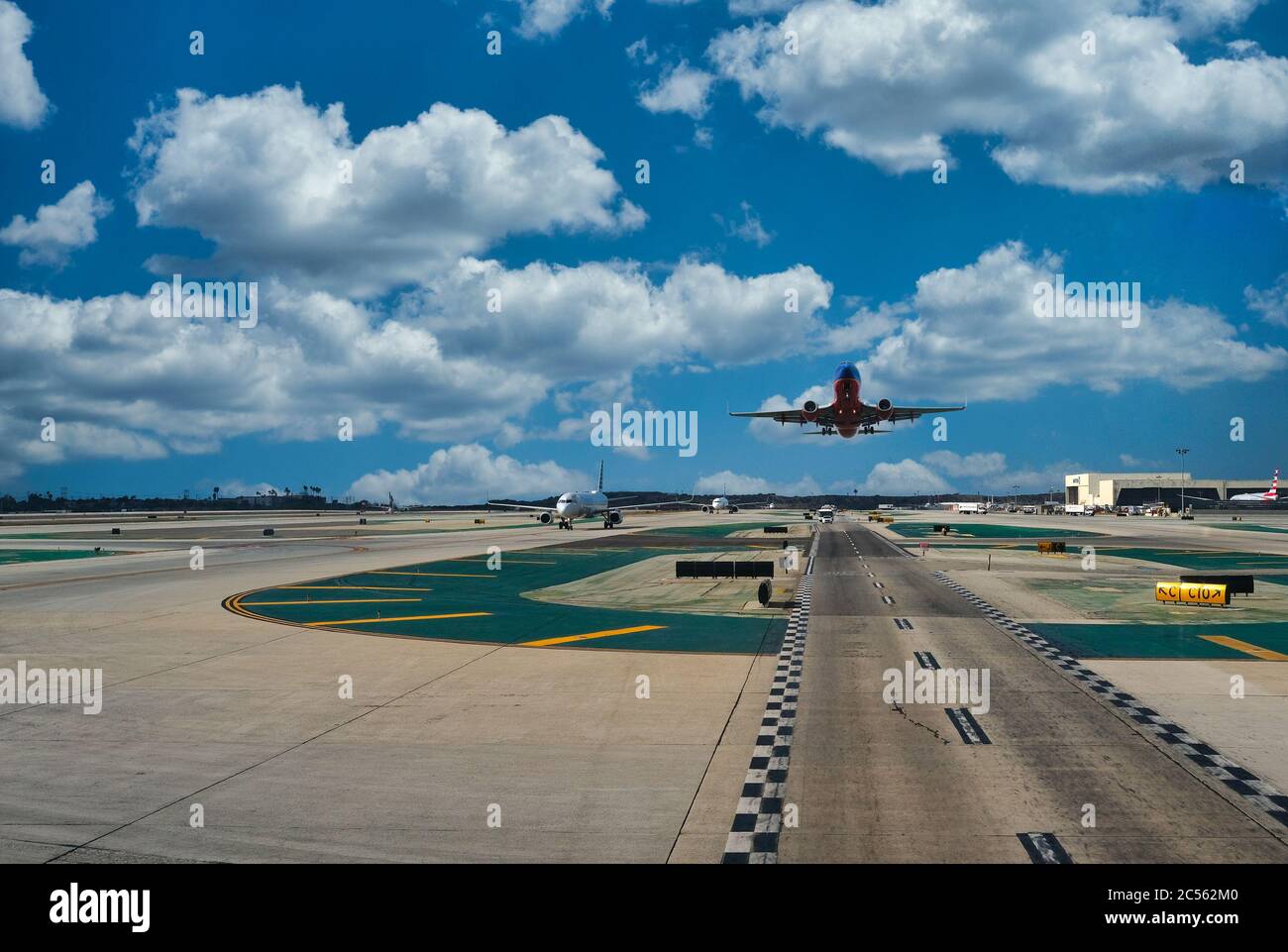 Plane Taking Off on Runway Stock Photo - Alamy