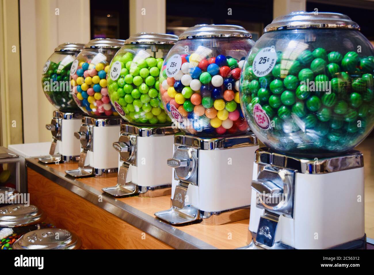 Large gumball machines with colorful chewing gums Stock Photo - Alamy