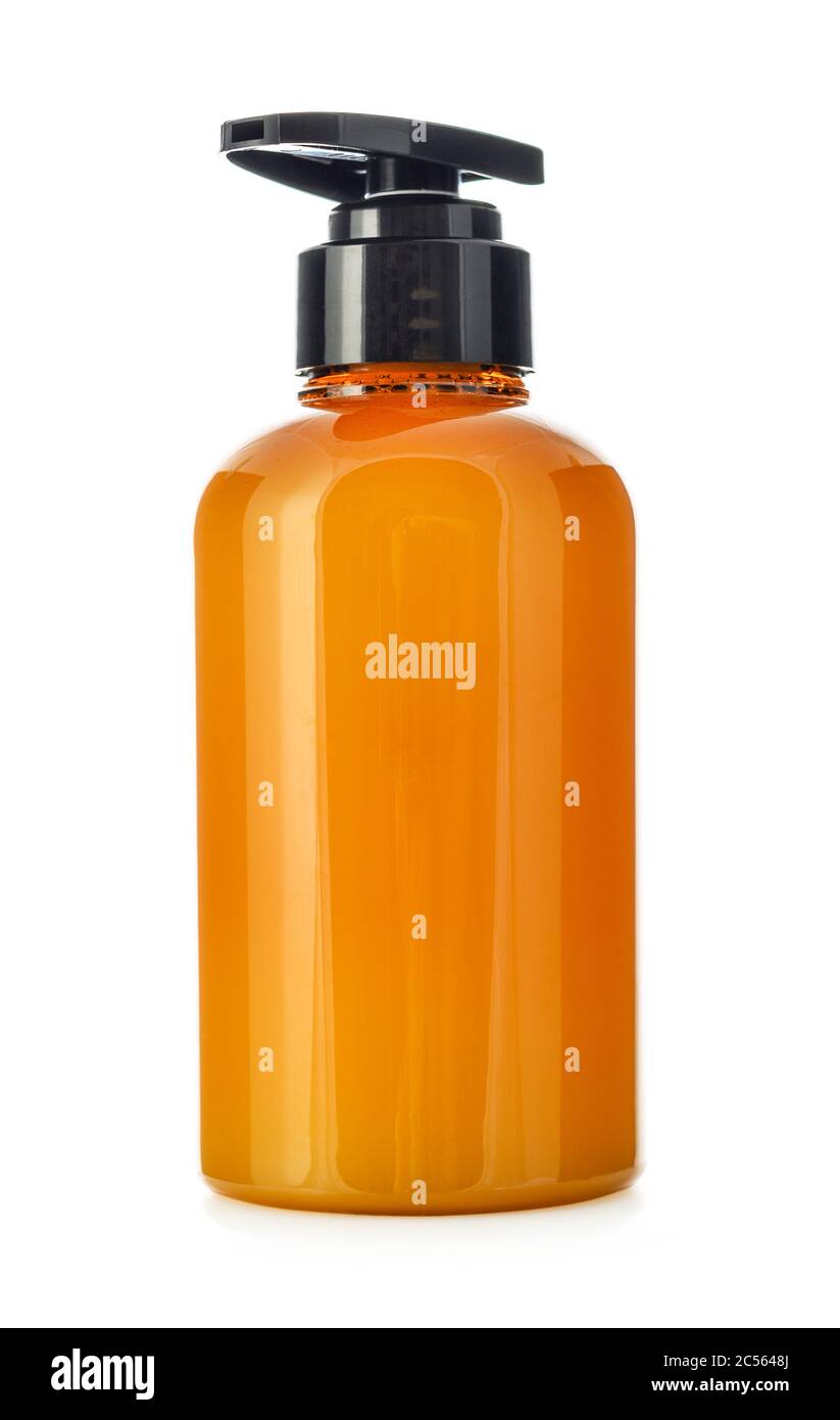 Plastic orange bottle with dispenser pumps isolated on white background ...