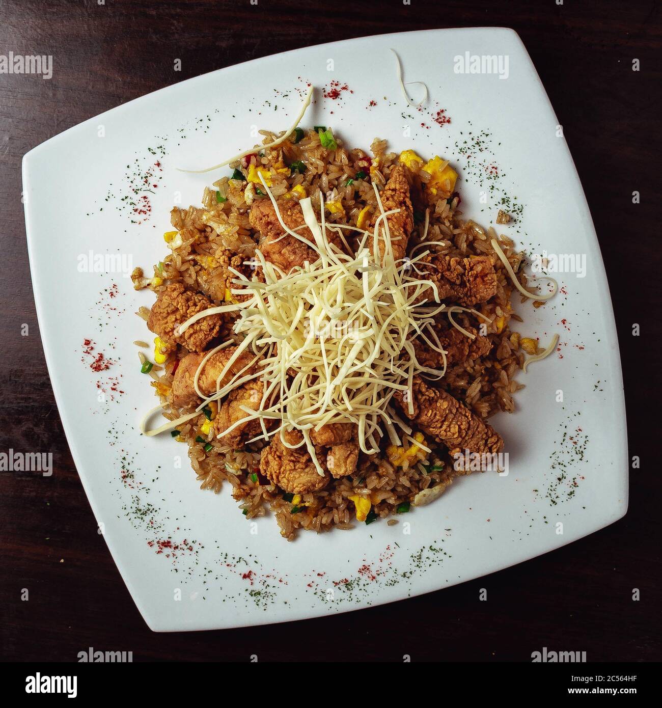 Top view of fried rice with fish and vegetables Stock Photo - Alamy