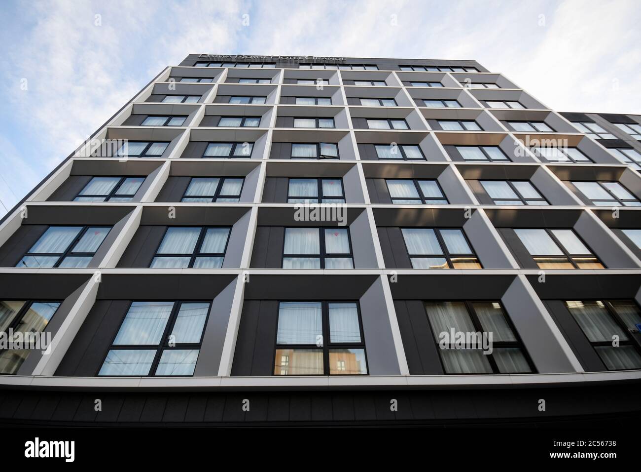 Perspective view of modern glass building Stock Photo - Alamy