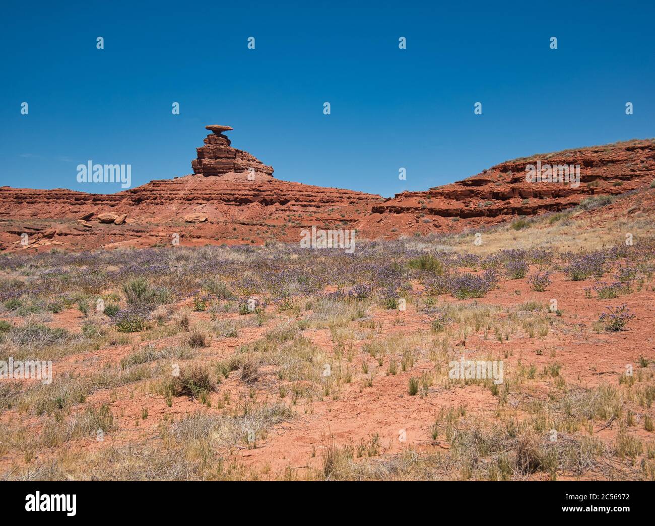 A stone slab on a rock looks like a head with a sombrero Stock Photo ...