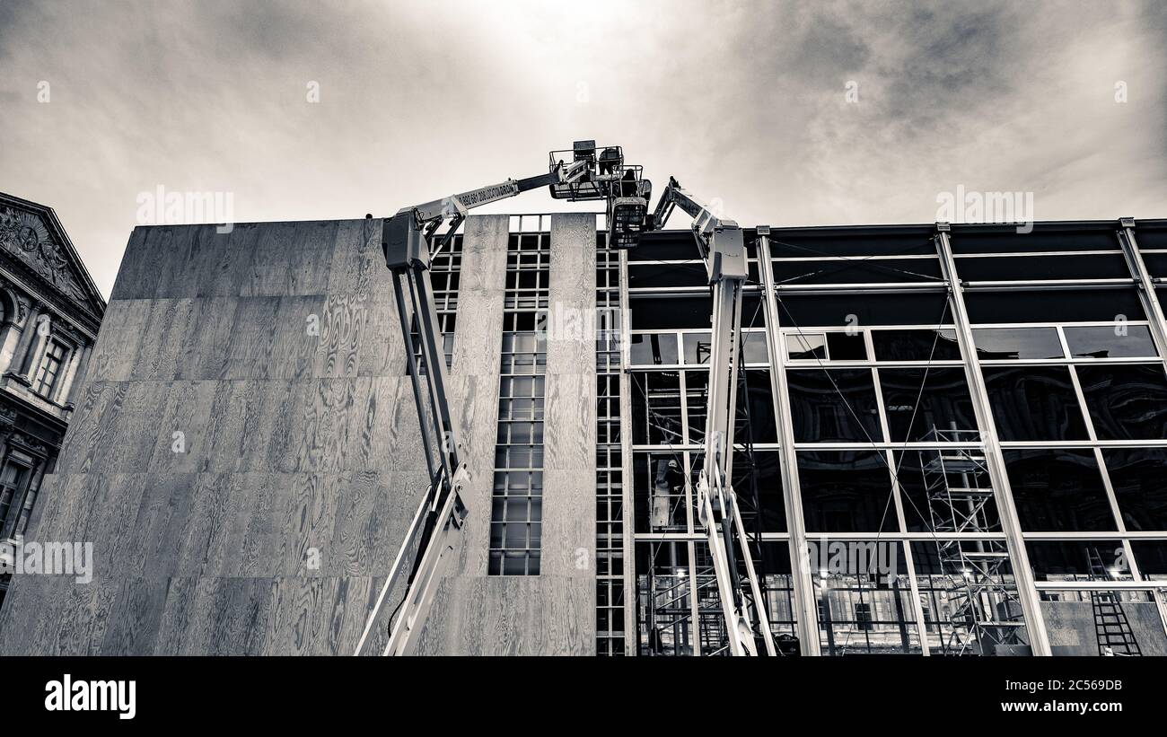 Grey scale shot of mobile moving cranes Stock Photo - Alamy