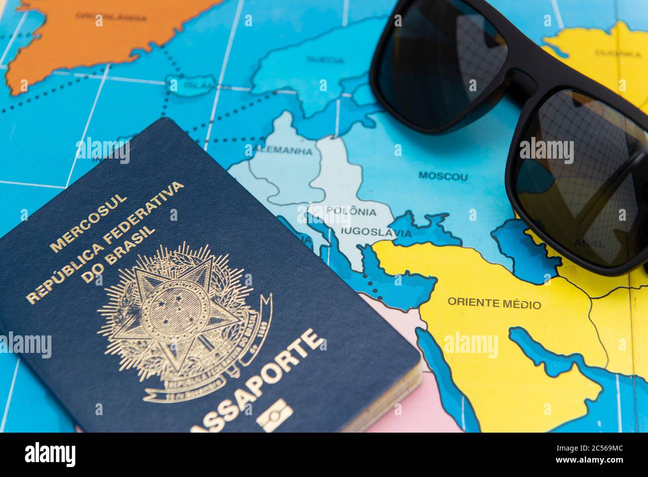 Top view of Brazilian passport over map. Focus on the European ...