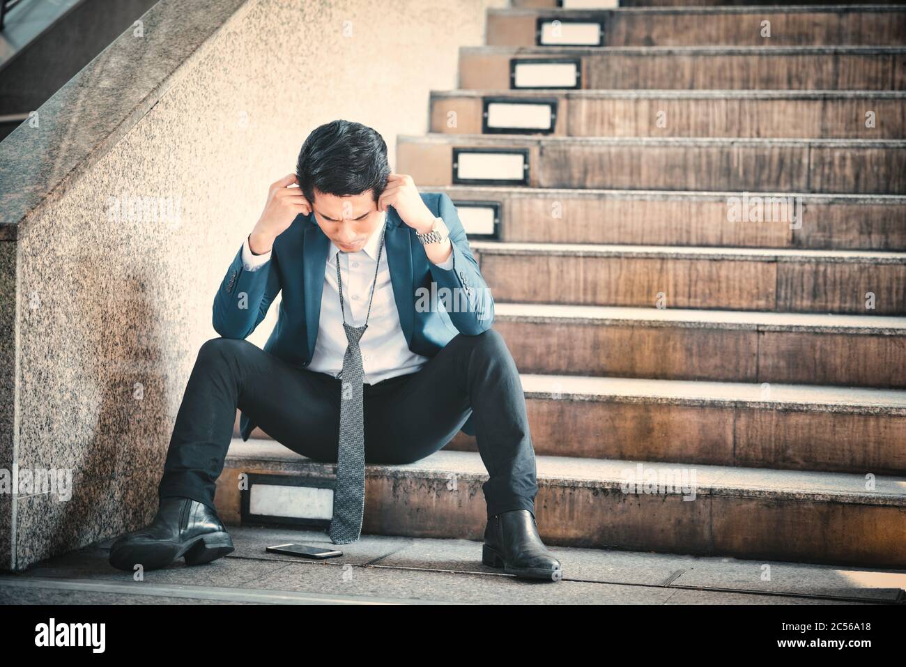 Sad businessman outside office hi-res stock photography and images - Alamy