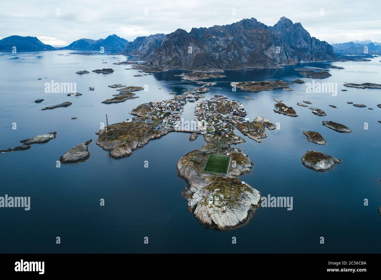 soccer field on the cliffs of HenningsvÃ¦r by the sea Stock Photo - Alamy