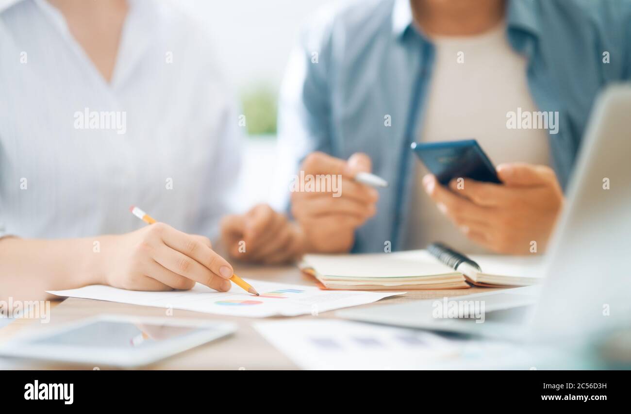 Working day in office. Collaborative teamwork Stock Photo - Alamy