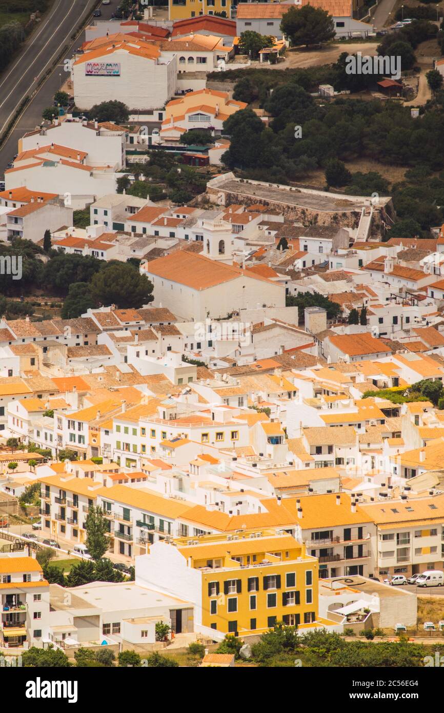 Aerial breathtaking view of the picturesque houses captured in Menorca ...