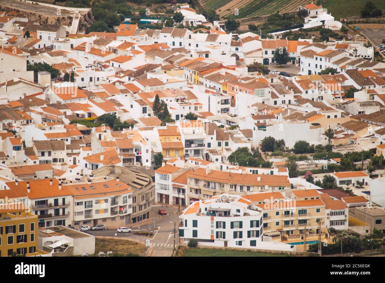 Aerial breathtaking view of the picturesque houses captured in Menorca ...