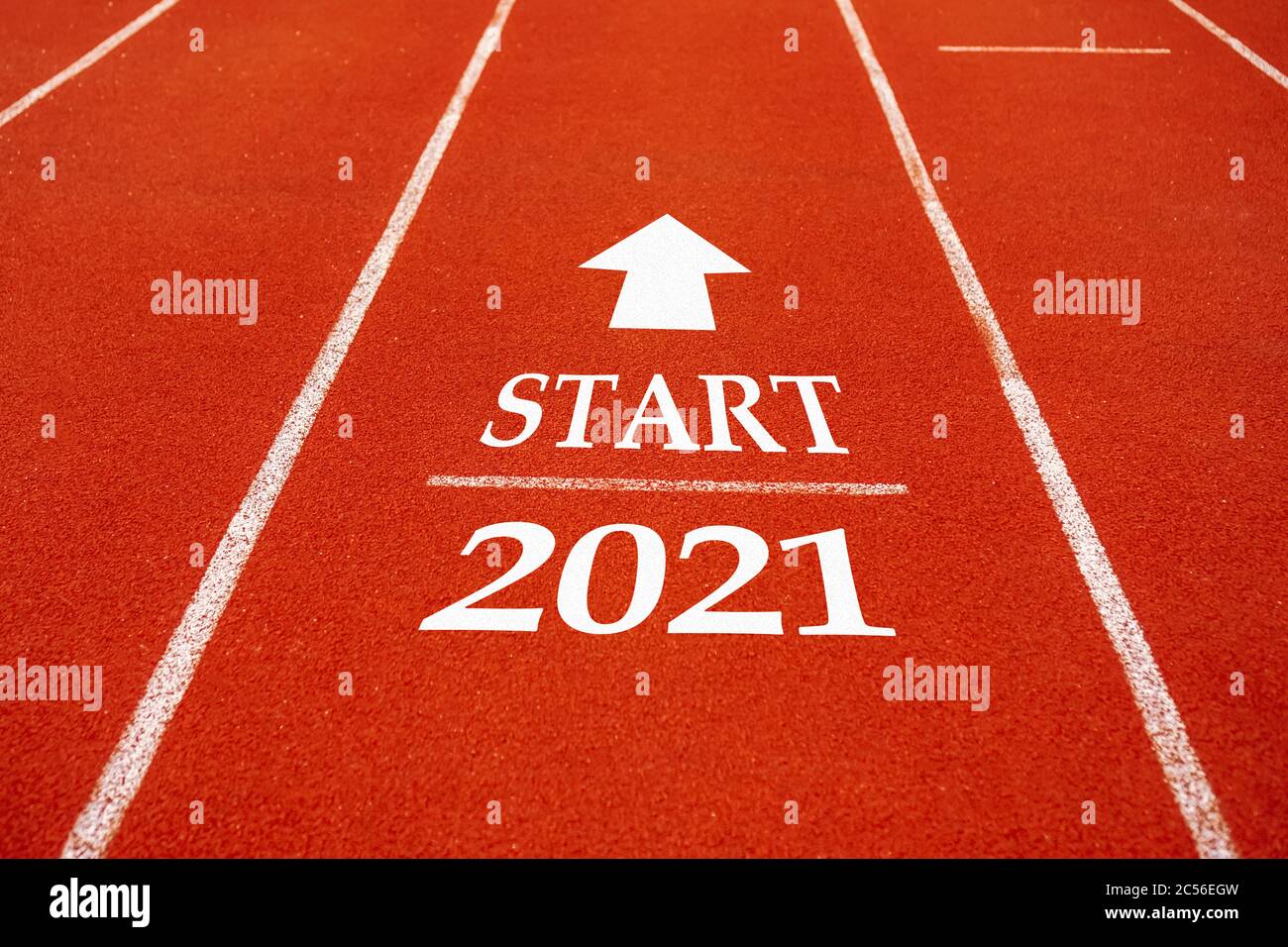 Start line to 2021 on running court represents the beginning of a ...
