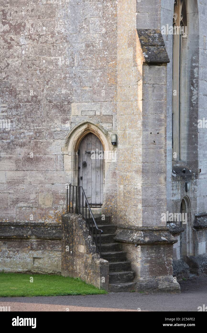 Small church side door and stone steps in St Marys church. Painswick ...