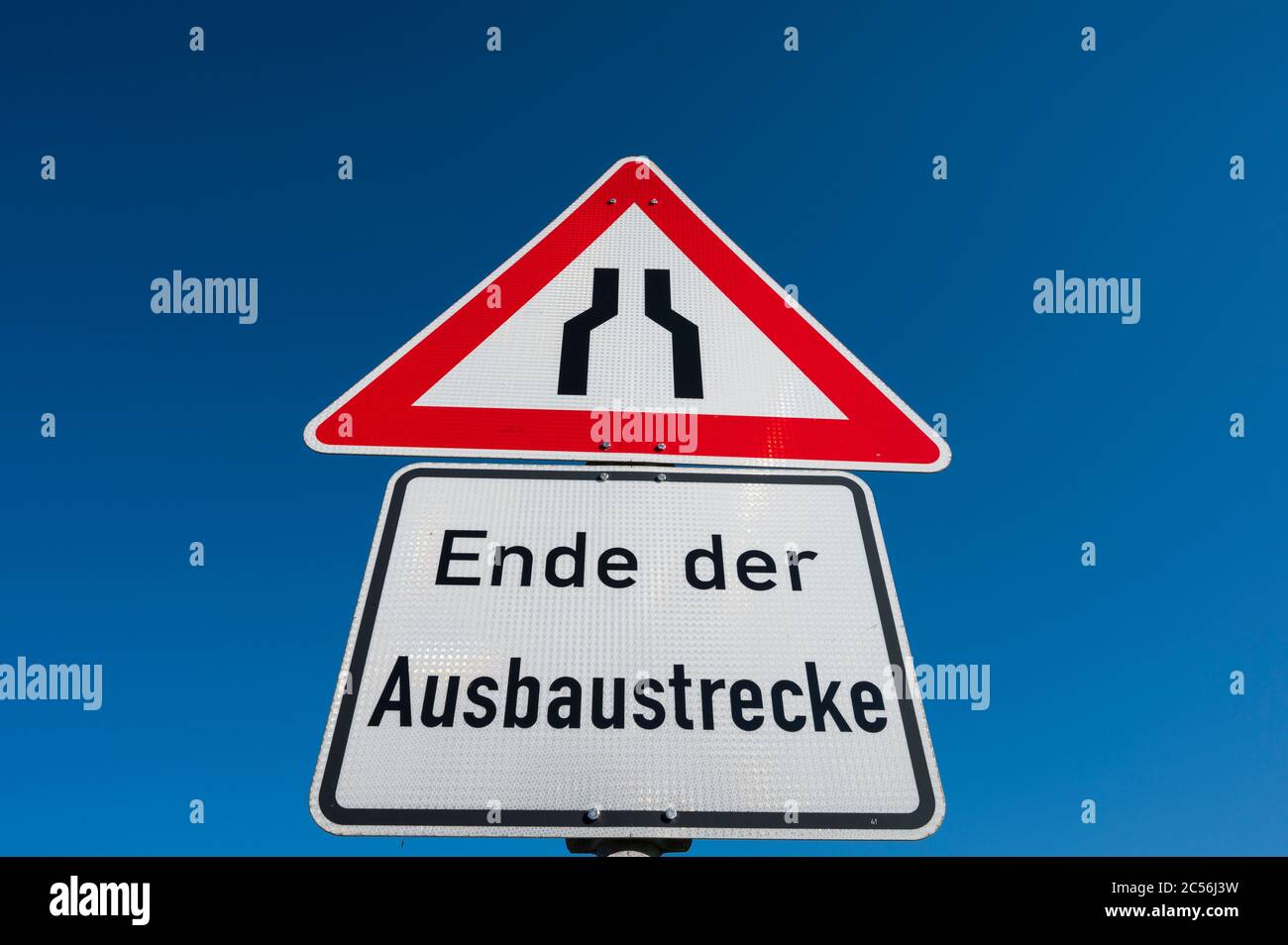 Road sign narrowing Stock Photo - Alamy