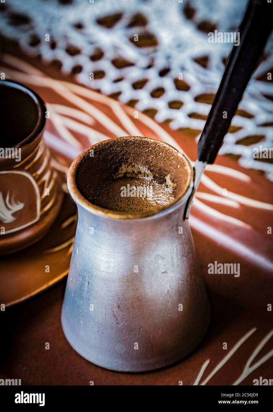 Old cezve coffee turkish pot with strong black turkish coffee ...