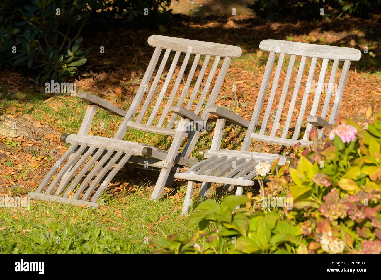 Two wooden reclining chairs hi-res stock photography and images - Alamy
