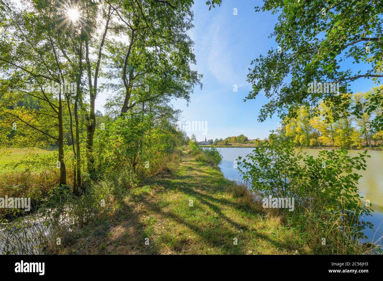 Fish ponds with sun Stock Photo - Alamy