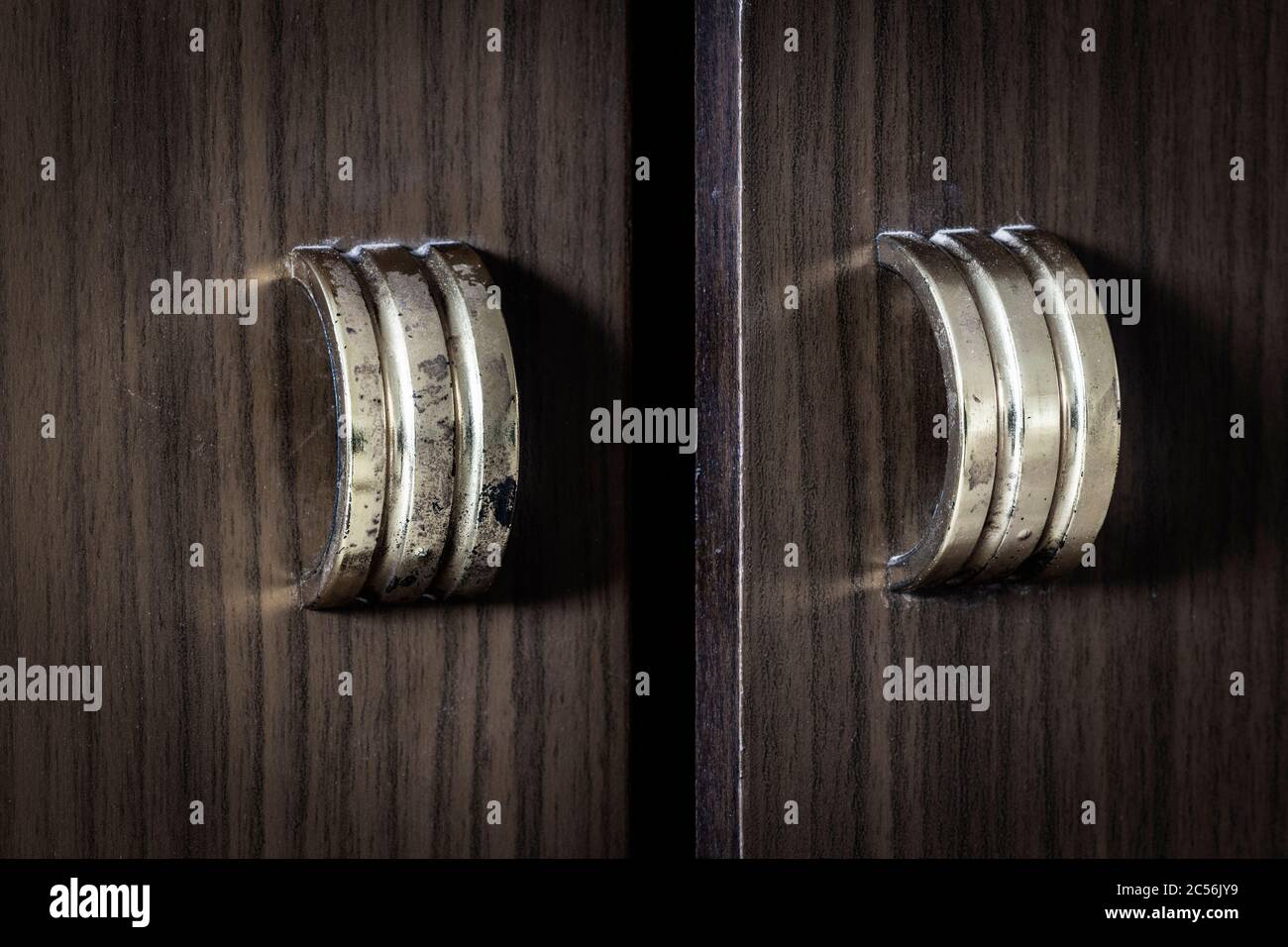 The old mysterious closet in the attic is ajar Stock Photo - Alamy