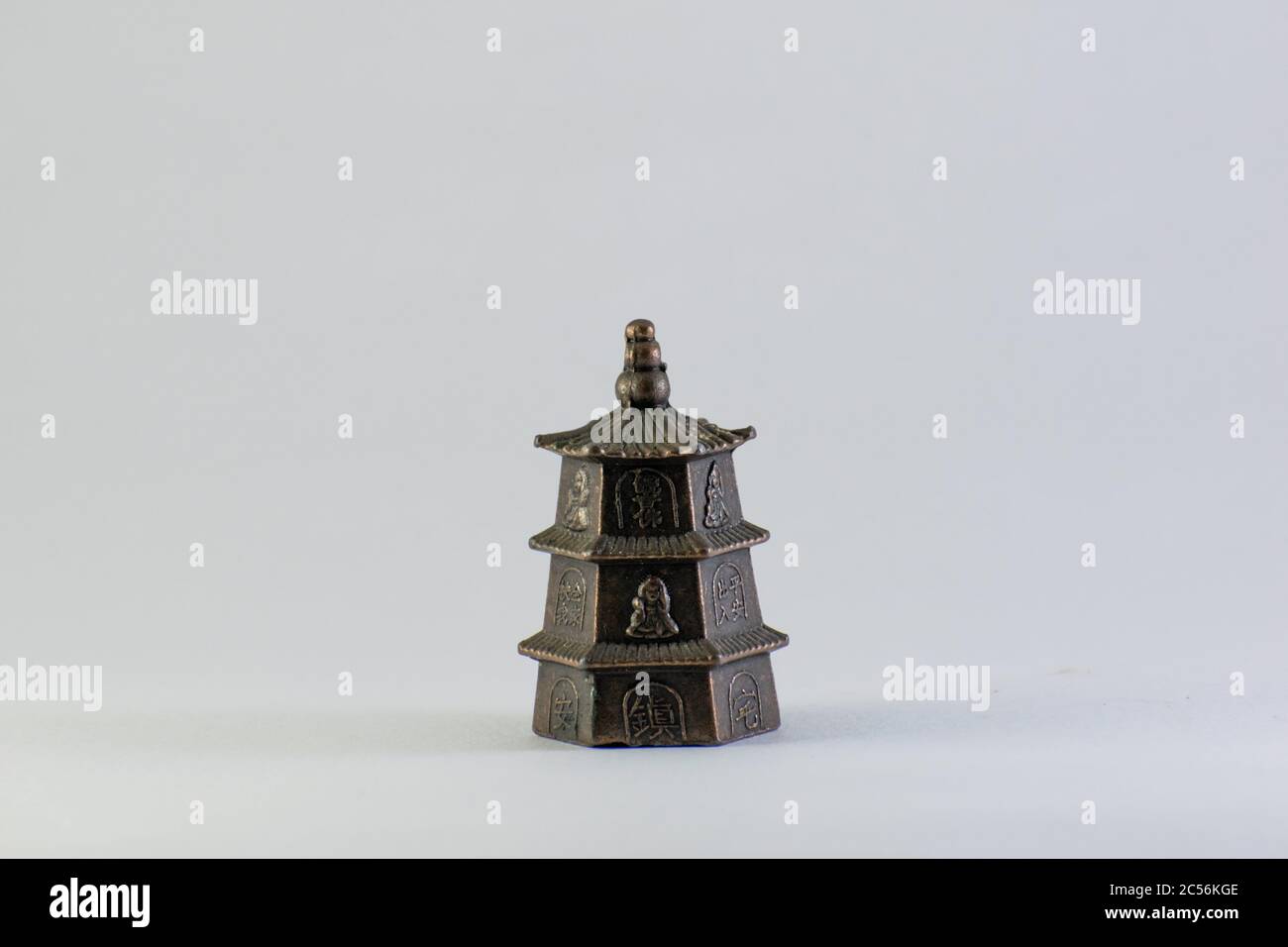 Mini Tibetan sothon isolated against a white background Stock Photo - Alamy