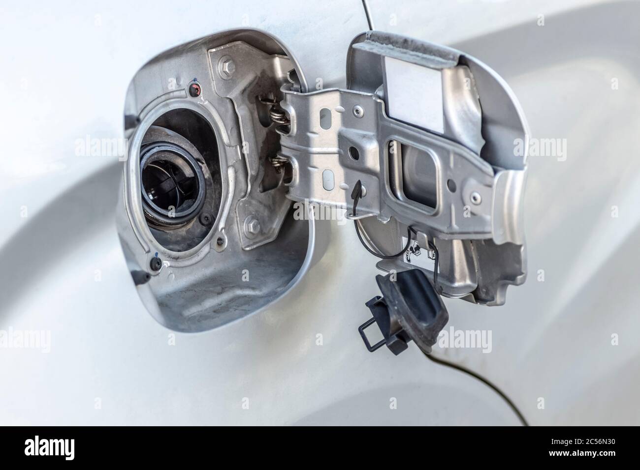 Open fuel filler neck of a passenger car close-up Stock Photo - Alamy