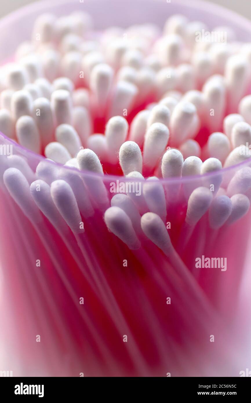 Red ear sticks in open plastic packaging close-up Stock Photo - Alamy