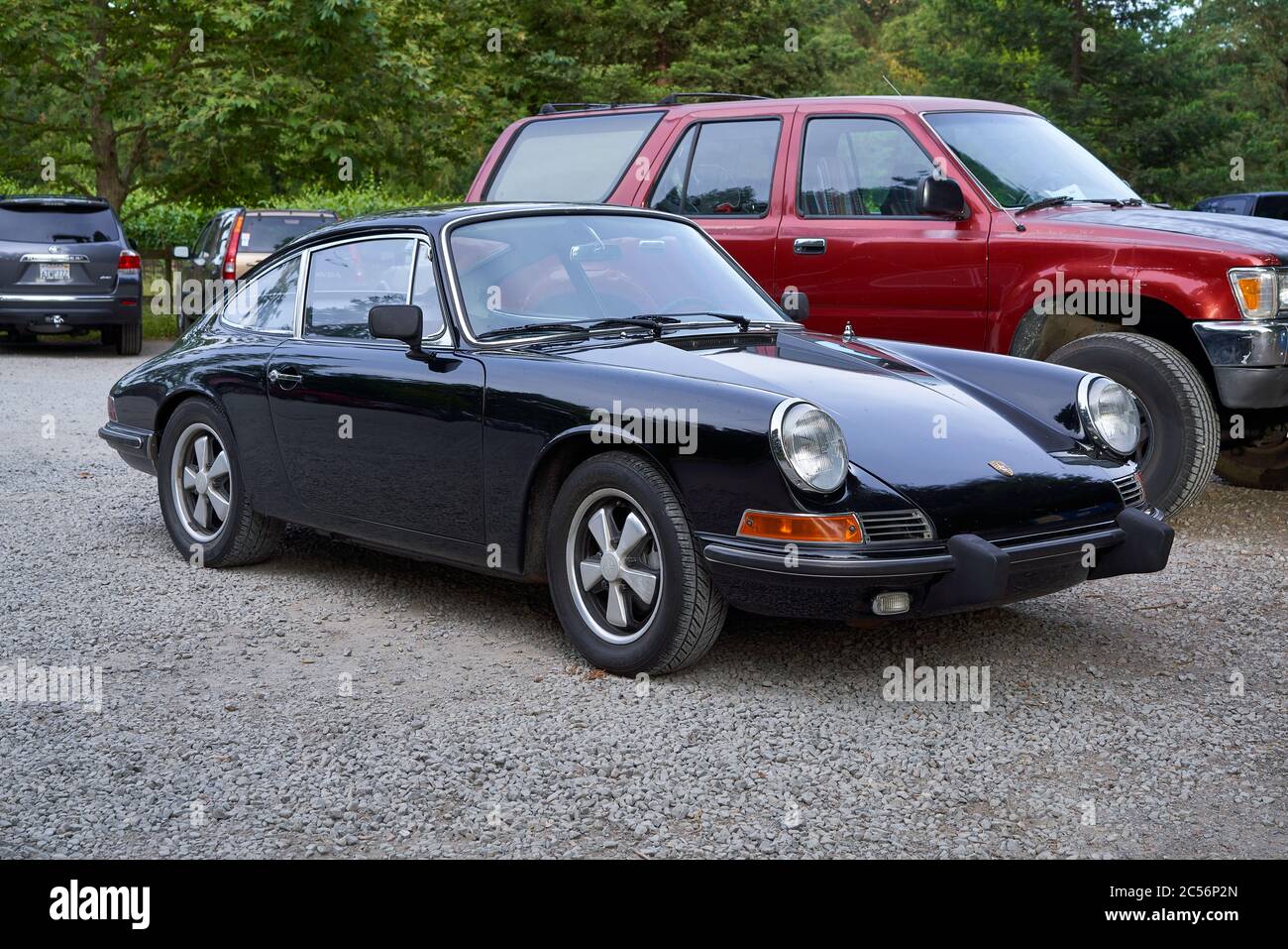 Black classic Porsche 912 car parked on gravel lot at Riverfront ...