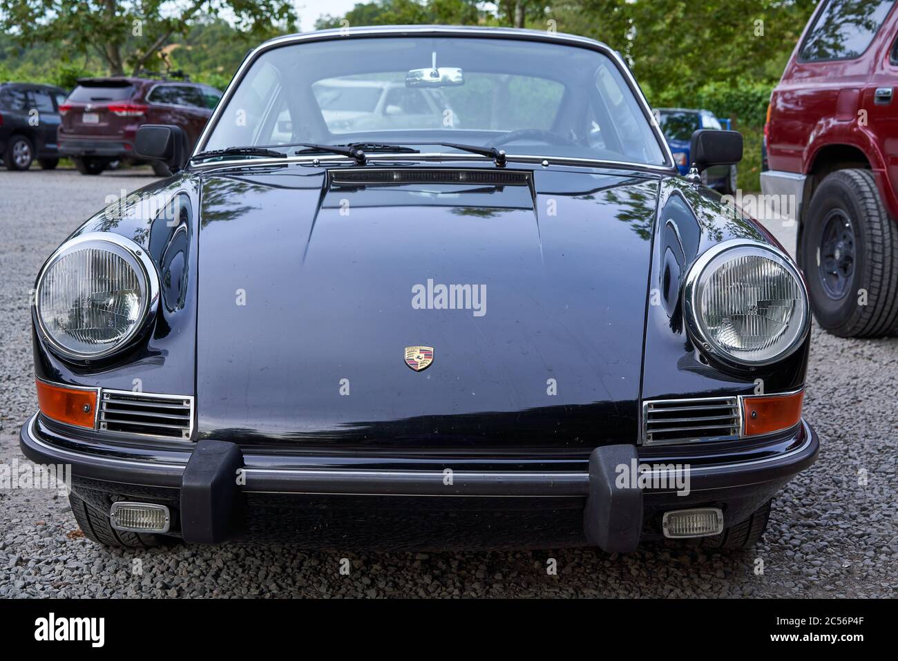 Black classic Porsche 912 car parked on gravel lot at Riverfront ...