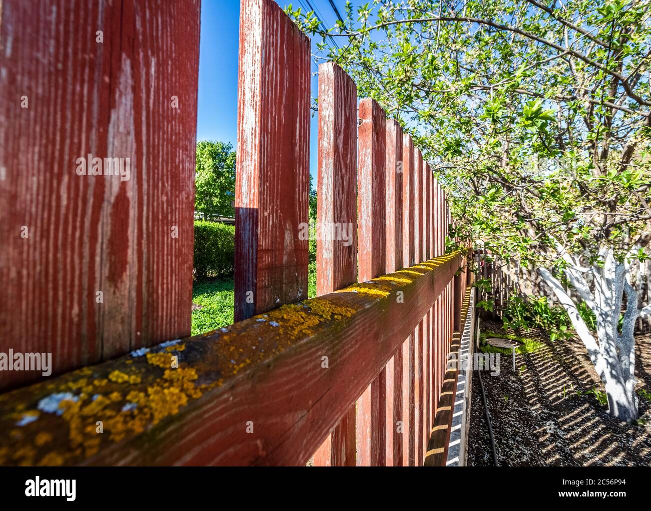 Red painted wooden fence hi-res stock photography and images - Alamy