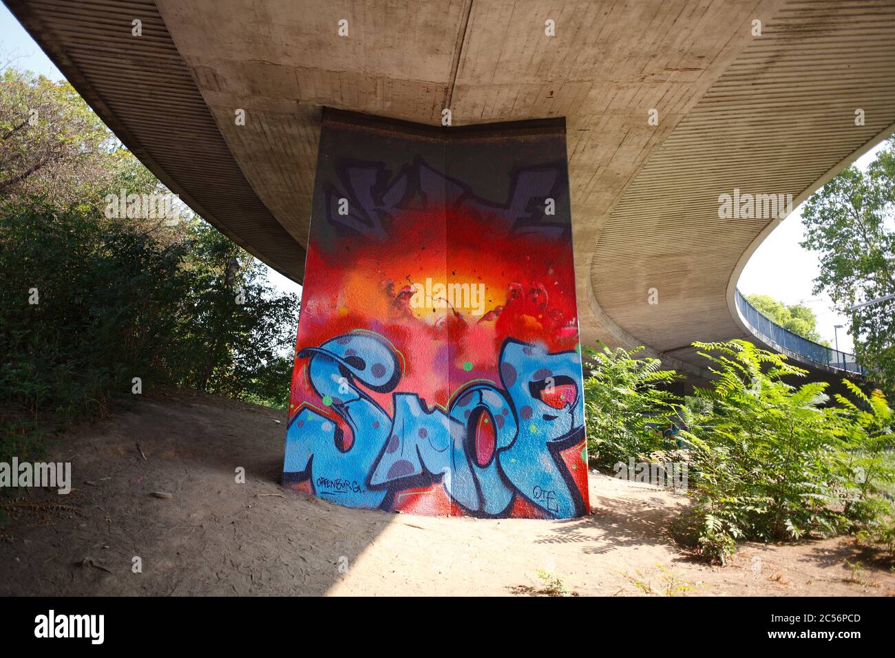 Colorfully sprayed bridge pier, Mannheim, Baden-Württemberg, Germany ...