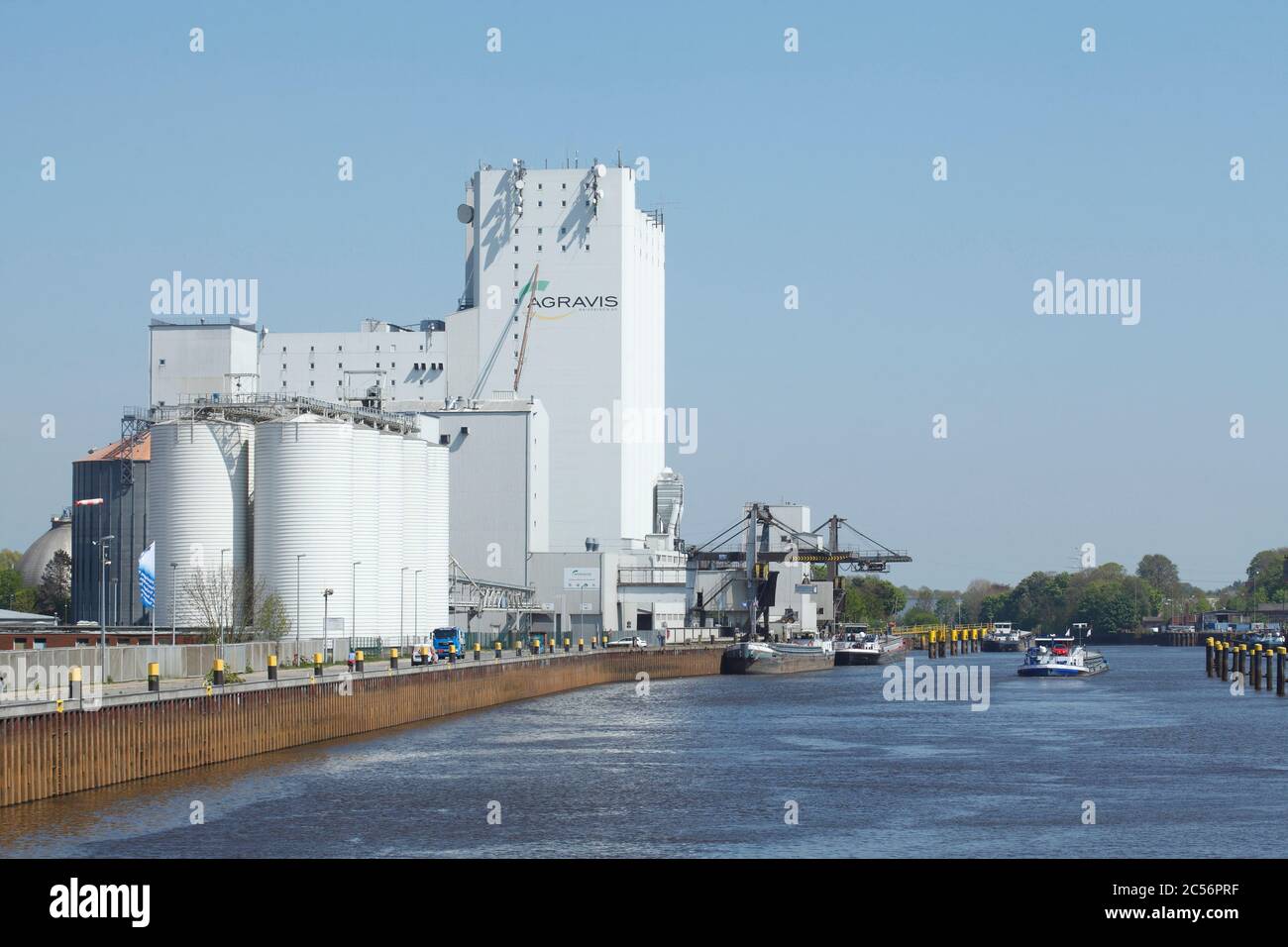 Oldenburg inland port on the hunte with ships and silos hi-res stock ...