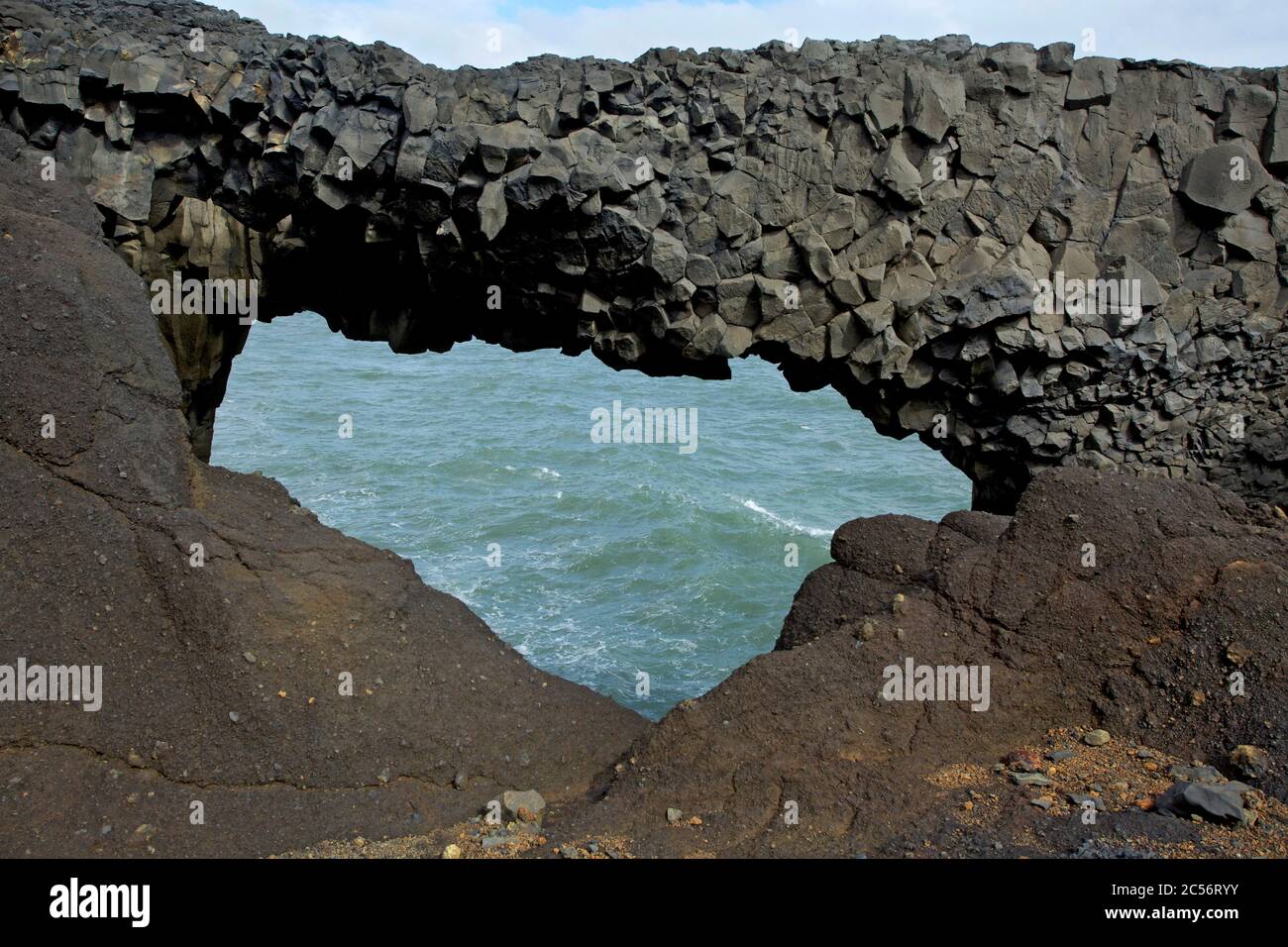 Rock bridge made of basalt columns and lava conglomerate at the ...