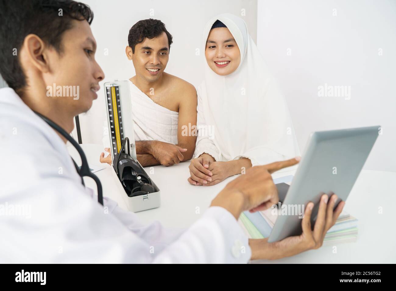 muslim medical checkup before hajj or umrah with doctor Stock Photo - Alamy