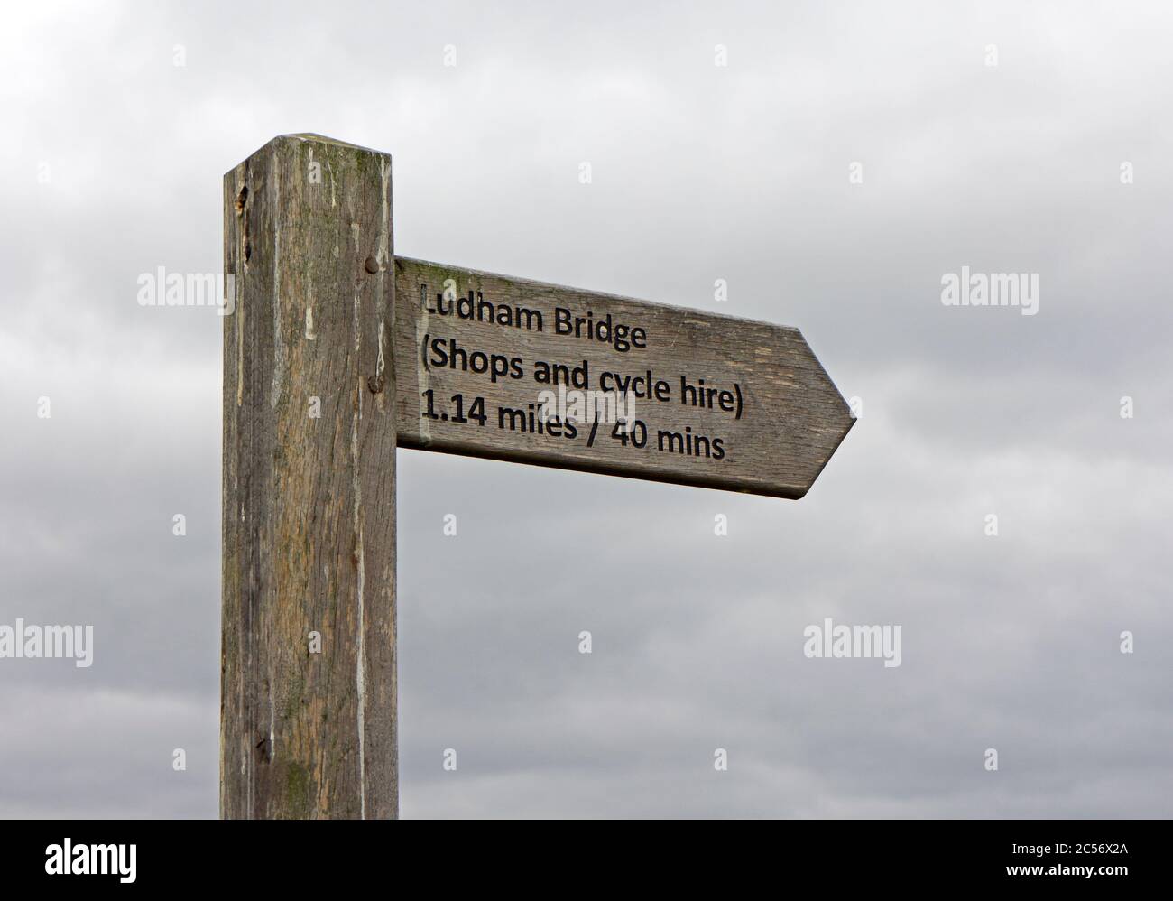 A fingerpost at St Benet's Abbey Gatehouse ruins giving footpath ...