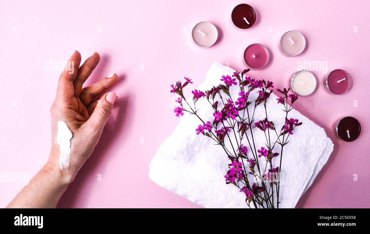 Hand care. Woman applying moisturizer cream on her beautiful hands for ...