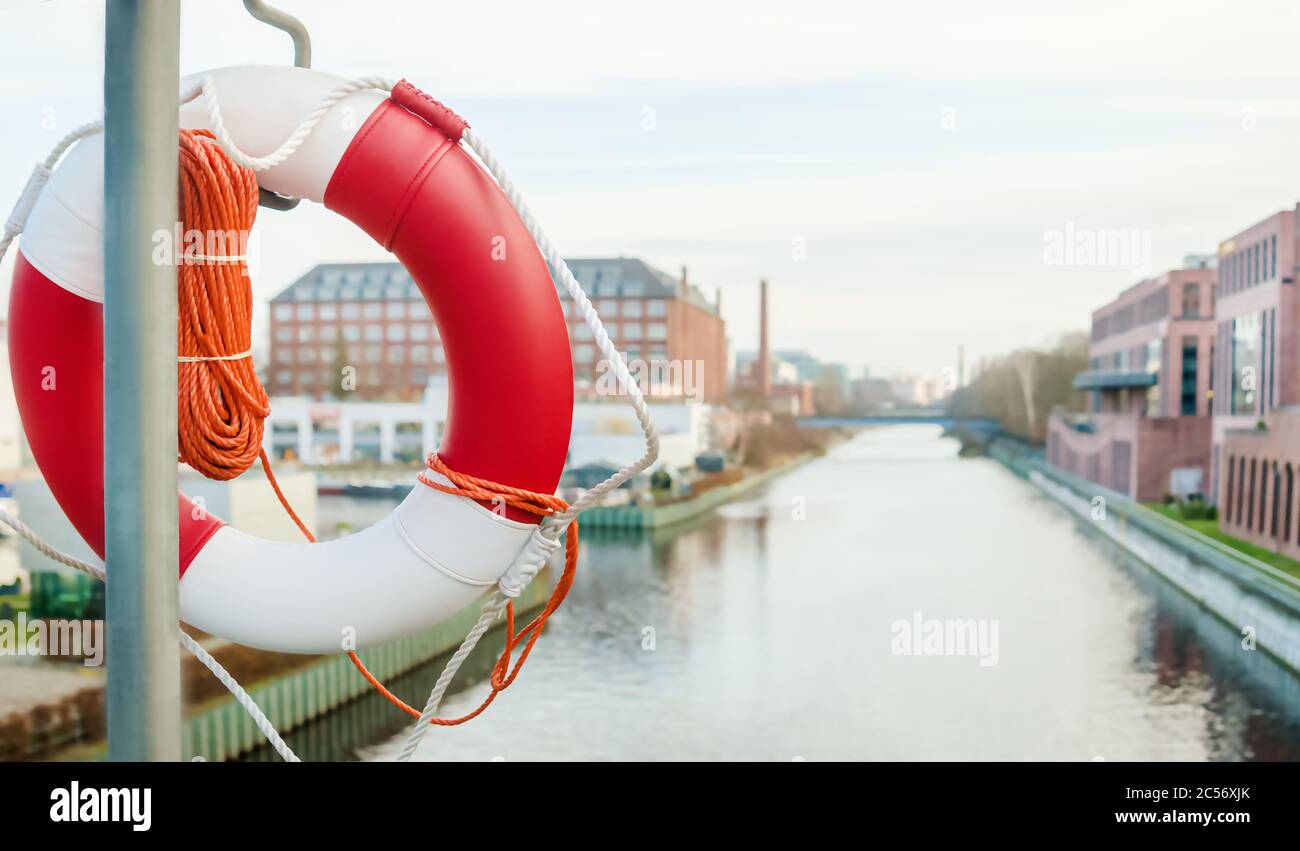 Lifebuoy on the city embankment. Coast security. For news of banner ...